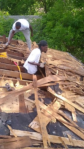 first class roofing working hard