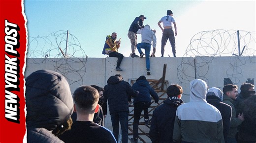 Pro-Kurdish protesters clash with police, climb border wall into Syria