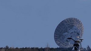 3D animation showing a large antenna dish moving to track a satellite | Premium Stock Video Footage