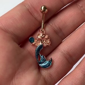 9.7K views · 311 reactions | So much detail packed into this beautiful mermaid belly ring 隆‍♀️✨ Shop the collection now  https://www.bodycandy.com/search?view=spring&q=aqua+rose+gold+mermaid | Body Candy Body Jewelry | Facebook