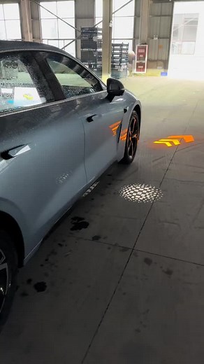 Modern Sedan Close-Up: Wheel and Bumper Focus