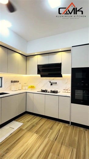 Simple and extraordinary, the ultimate experience - CMK Aluminium Kitchen Design create a high-quality kitchen for you✨ The matte cabinet door in milk tea color is quiet and warm, bringing a touch of tranquil elegance to the kitchen 🌿. The rock slab countertop and background with golden marble patterns not only show noble temperament, but also make your cooking space full of natural artistic sense 🎨. Every detail interprets the luxury in low-key. The carefully designed white steel dish rack is