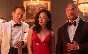‘Red Notice’ Review: Ryan Reynolds, Dwayne Johnson, and Gal Gadot Star in Netflix’s Breezy Mega-Budget Caper