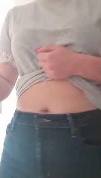 Buttoning and unbuttoning tight blue jeans #3