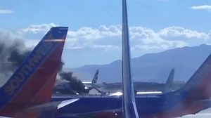 Plane catches fire at Las Vegas airport