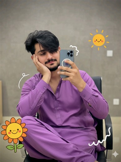 1: Open Gemini app 2: Upload a photo 3: Paste the prompt Prompt:Aesthetic cozy mirror selfie of a young man (face unchanged) sitting casually on a chair, wearing a purple traditional cotton shalwar kameez. 3 upper button is open, do Dark messy black hairstyle, slightly disheveled, with strands falling over his forehead and partly covering his eyes. holding a Iphone 17 promax in one hand, resting his face on the other hand with a soft dreamy smile. Warm grey indoor background with soft studio lig