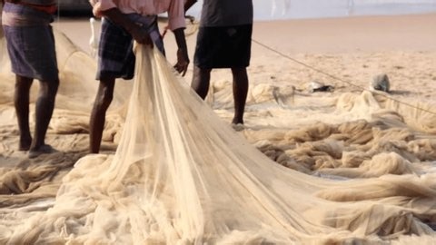 clip-3973842035-kanyakumariindia-03012025fishermen-checking-collecting ...