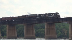 Norfolk & Western Class J No. 611 is seen in this clip crossing the Shocks Mills Bridge, just north of Marietta, PA as part of her third day ferrying to the Strasburg Rail Road for a series of excursions and events in late September and much of October. This shot capped off a five hour wait at this location. | Big Jim Video Productions