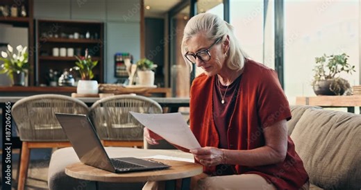 Finance, laptop and senior woman in home with paperwork for online banking, payment and savings. Retirement, documents and elderly person with bills for pension fund, budget planning and taxes