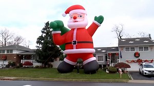 Homeowner's enormous inflatable Santa Claus brings extra holiday spirit to New York residents