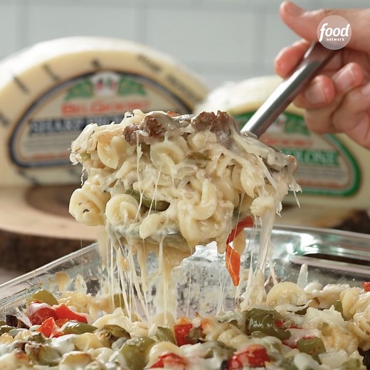 This pasta bake is inspired by a Philly Cheesesteak 🤩 It's loaded with thinly shaved beef, sweet and hot peppers and TWO types of provolone! Save the recipe: https://foodtv.com/3gST1qL | Food Network
