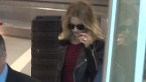 Rosie Huntington-Whiteley Flashes Engagement Ring At LAX
