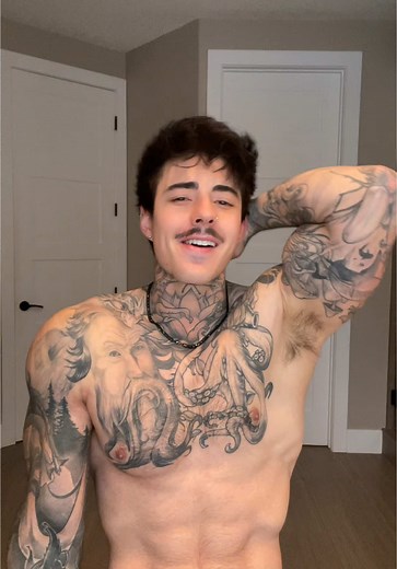 Showcasing Intricate Tattoos on a Muscular Build