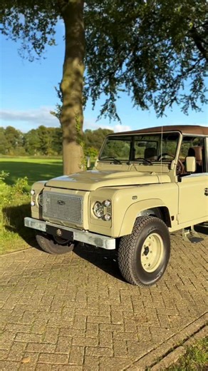 RiverHouse Landrover on Instagram: "For Sale: 2005 Land Rover Defender 110 TD5 Cabriolet Fully frame-off restored and finished in elegant Sage Green with a new chocolate Mohair soft top (plus matching bikini top) and teakwood floors. Highlights: ⚙️ Rebuilt TD5 engine tuned to 180 BHP 🪑 Chocolate leather interior, 9 seats 🛞 Wolf wheels with new tires 💡 LED lighting + OEM Bi-LED headlights 🔩 Galvanized soft top frame & NAS rear bumper 📍 Netherlands | 🇺🇸 Not for U.S. import 💰 Price on reque