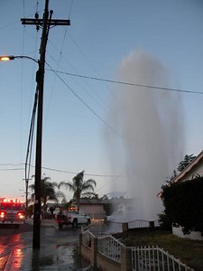 Photo Gallery: Crash Knocks Over Fire Hydrant, Geyser Erupts