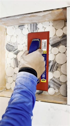 ✨ 6 Crucial Steps for Planning the Layout for a Niche ✨ Transform your shower niche with a stunning tile design! Follow these essential steps to achieve a flawless layout: 1. Measure and Create a Template: Start by accurately measuring your niche. Use cardboard or paper to create a template that matches your space perfectly. 2. Plan and Sketch Your Design: Sketch your desired pattern directly on the template. This step helps you visualize the final look and make adjustments before installation. 