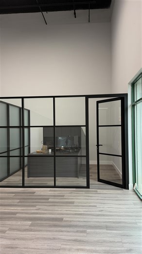 Office zoning with style and functionality. This project shows an interior aluminum & glass partition system used to divide a commercial space with high ceilings into three private offices. The partitions are installed at 8 ft height, without fixing to the ceiling — a smart solution for open commercial spaces that creates privacy while keeping the interior visually light. 🔹 Partition system: TP-38 🔹 Swing doors: D40, standard size 36” x 8’ 🔹 Design option: GRID 🔹 Glass combination: – Frosted