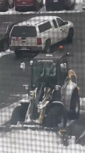 Wacker neuson snow plow plows the snow