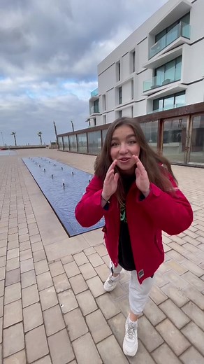 Walking by Modern Fountains in Outdoor Setting