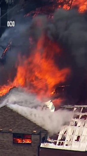 Firefighters are battling a massive factory blaze in Sydney's south-west, with nearby properties at risk. More than 50 firefighters with 12 trucks were called to a timber flooring factory between Claremont Avenue and Beresford Avenue in Greenacre just before 3pm on Tuesday. Fire and Rescue NSW (FRNSW) said water supply had been an issue as crews worked to protect surrounding properties. Full story: https://www.abc.net.au/news/2025-12-30/nsw-greenacre-firefighters-battle-flooring-factory-blaze/10