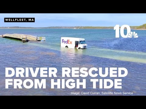 Fed Ex truck driver rescued from high tide on Cape Cod