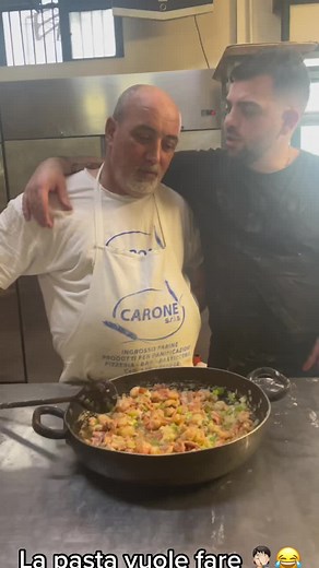 Cooking Pasta with Fresh Ingredients in a Professional Kitchen