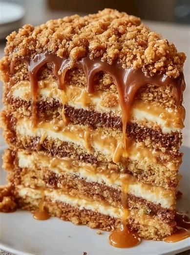 69K views · 1.1K reactions | Caramel Crunch Layer Cake A tall, indulgent cake stacked with buttery layers, rich caramel filling, and a crunchy crumble topping. Yield: Serves 10–12 Temp & Time: Bake at 350°F for 25–30 minutes per layer Key Ingredients First: All-purpose flour Granulated sugar Unsalted butter Caramel sauce ....................... FULLL Recipe in First Cօʍʍеոτ  | Cake Shake | Facebook