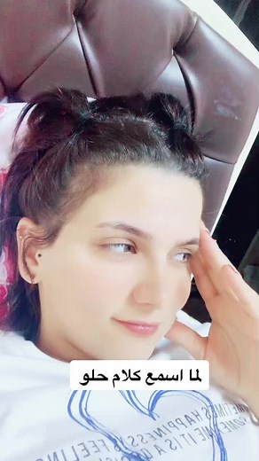 Relaxed Individual on Brown Leather Couch