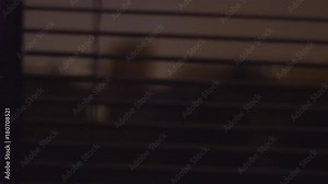 view from the window to the stormy sky. night outside, outside the window dressed with rains and lightning flashed. seen from the window high houses 4k