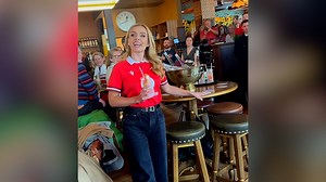 Katherine Jenkins sings national anthem in bar