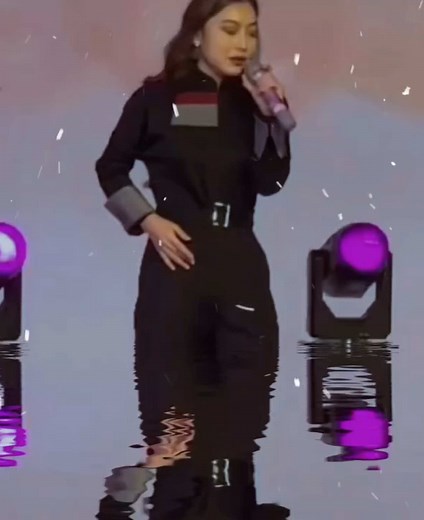 Captivating Performance on Stage with Microphone