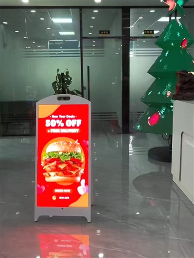 Tired of traditional static posters? It’s time to light up your brand with our premium White Edition LED Outdoor Sign Board! ⚪✨ ​With a larger 640mm x 960mm screen size and a sleek aluminum profile, this isn't just a sign—it's your most hardworking salesperson. ​Why business owners love it: 🔥 Ultra-High Refresh Rate (7680Hz): Flicker-free visuals that look amazing on camera and in person. ☔ IP65 Waterproof: Rain or shine, your message stays bright and clear. 🛠️ Maintenance Made Easy: Supports 