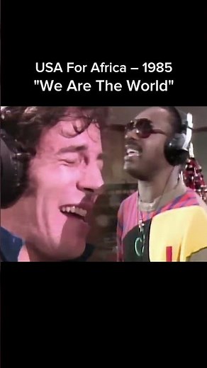 Stevie Wonder & Bruce Springsteen sing as an unexpected duo in the 1985 We Are The World music video