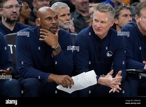 Golden State Warriors assistant coach Jerry Stackhouse, left, sits with head coach Steve Kerr during an NBA basketball game between the Warriors and the Phoenix Suns in San Francisco, Friday, Jan. 31, 2025. (AP Photo/Jeff Chiu Stock Photo - Alamy