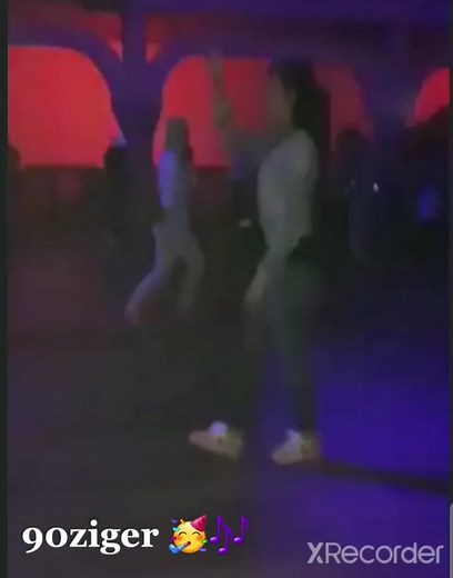 Energetic Dance Party in Colorful Lights