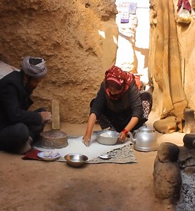 2.7K views · 33 reactions | Step back in time with me as I visit a village where life and cooking are still done the old-fashioned way – over an open wood fire! Experience the raw simplicity and authentic flavors of cooking without modern tools. This is rural life at its purest!  #StoneAgeLiving #TraditionalCooking #VillageLife #CookingOverWood | Melaine | Facebook