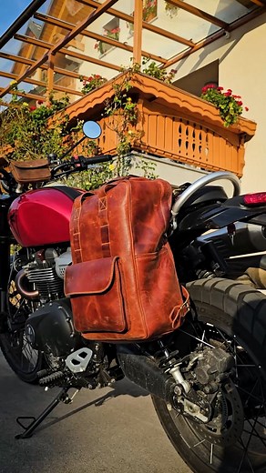 Sometimes the road is long, and your shoulders deserve a break. That’s why we built our backpacks to double as panniers, ready to mount on the bike when you want to ride light. In this one, we’re in a town in Europe, setting up the Eastwood just the way it was meant to be used, hands-free, hassle-free, and built for the ride. #tripmachine #tripmachinecompany | Trip Machine