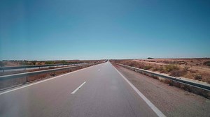 Motion timelapse of day drive on a high way road.