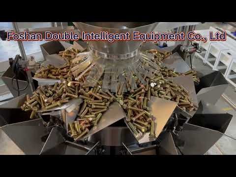 Машина для взвешивания и упаковки винтов в коробки