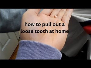 how to pull out a loose tooth at home