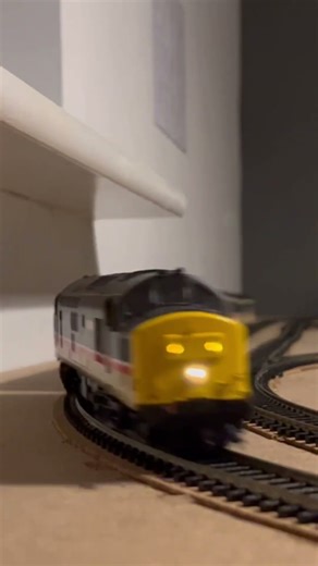 Class 37 pass through Benchester at speed past Benchester station