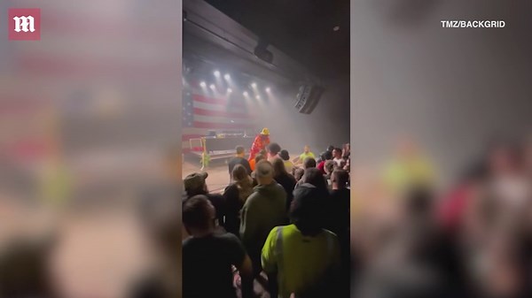 Rapper Afroman falls off the stage while performing 'Because I Got High'
