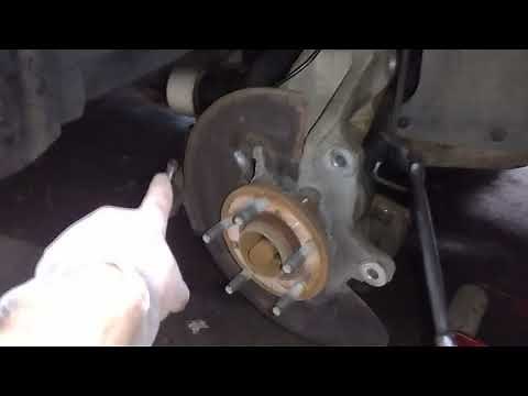2010-12 ford Taurus strut replacement. "trick"