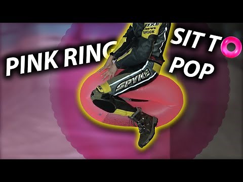 Inflatable pop - Popping pink swim ring with sitpop