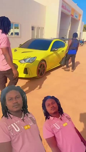 Catchy Conversations by a Stunning Yellow Sports Car