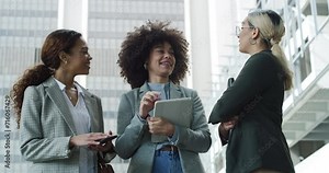Tablet, teamwork or businesswomen in city planning in discussion for social media, website or news online. Teamwork, happy people or professional employees on road talking or speaking in conversation