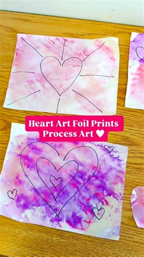 Scholar's Choice on Instagram: "Heart Art Foil Prints ❤️🌈 This sweet and simple process art invitation is full of love and learning! 💕 Children will explore colour, pattern, and texture while creating beautiful heart-themed prints — just in time for Valentine’s Day! 🎨 Start by drawing bold hearts on white paper using a black marker. Then, invite children to roll or press their hearts onto foil that’s been covered in paint and sprinkled with coarse salt. Watch the magic unfold as they lift the