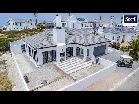 A brand new home that elevates everyday living in Shelley Point Golf Estate