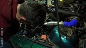 a mechanic builds and installs a cold air intake system on a drift car with a turbo engine