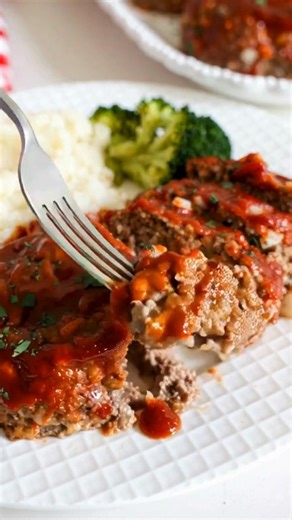 This delicious and easy mini meatloaf recipe features all the classic flavors of meatloaf, like onions, garlic, and Italian seasonings, baked up tender and moist with a simple three-ingredient glaze. | Recipes - Food Network